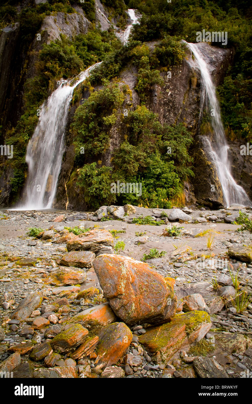 Twin waterfalls and rocks Stock Photo - Alamy