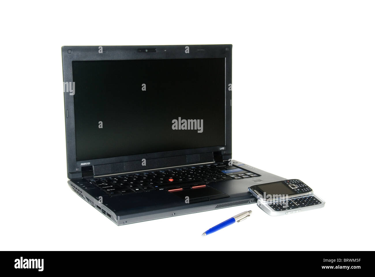 Black laptop computer with mobile phone and pen on a white background ...