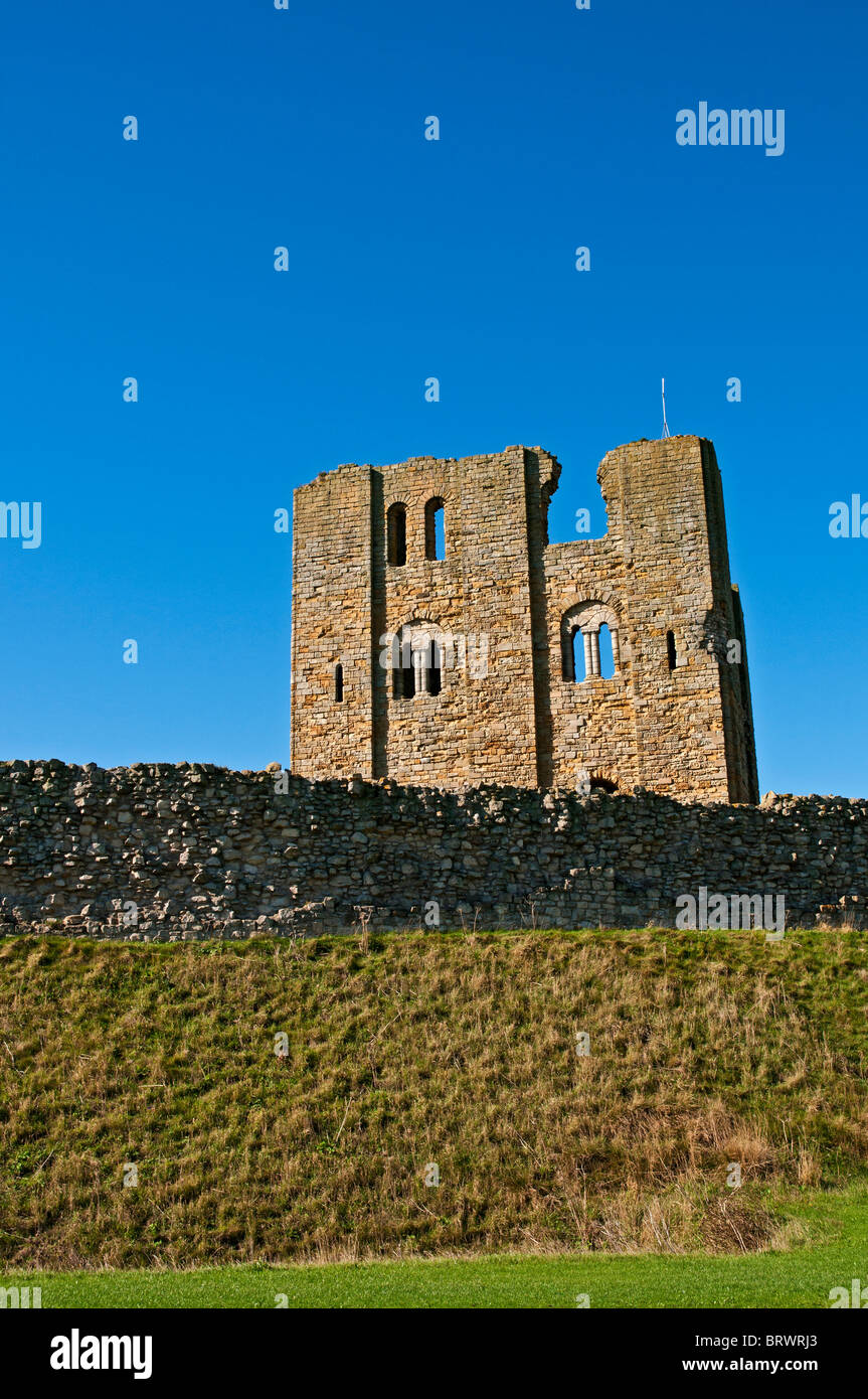 The Castle Keep built on a steep grassy mound and protected by a stone ...