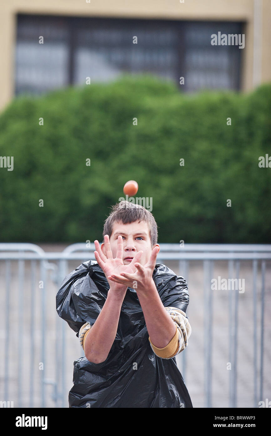 Catching egg hi-res stock photography and images - Alamy