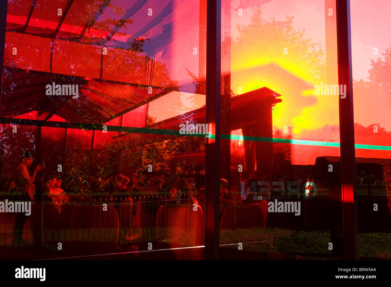 Red-tinted window landscape caused by the Serpentine Gallery's ...