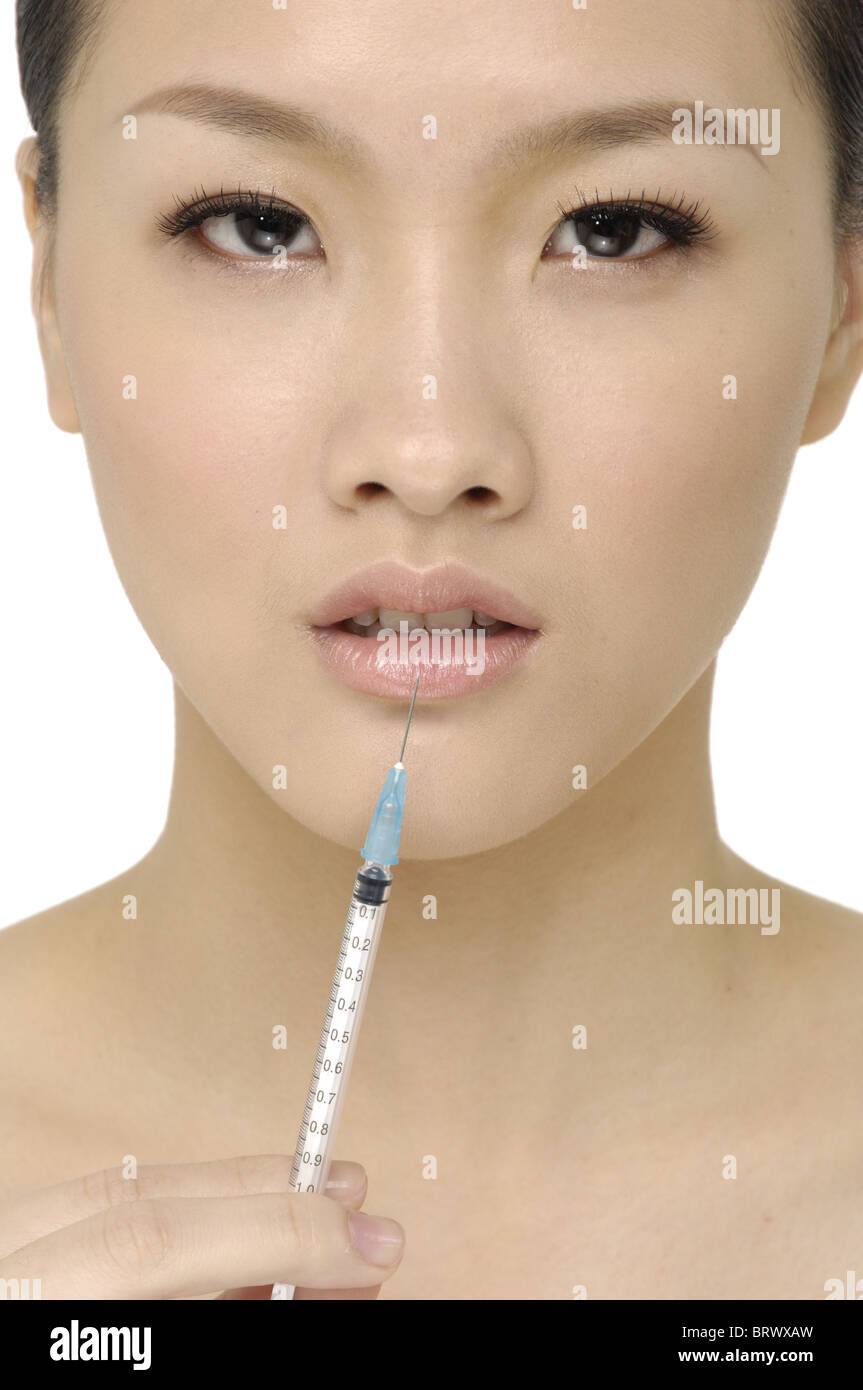 Close up botox injection process hi-res stock photography and images ...
