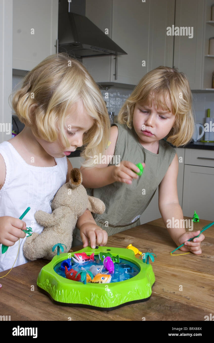 2 girls fight toy hi-res stock photography and images - Alamy