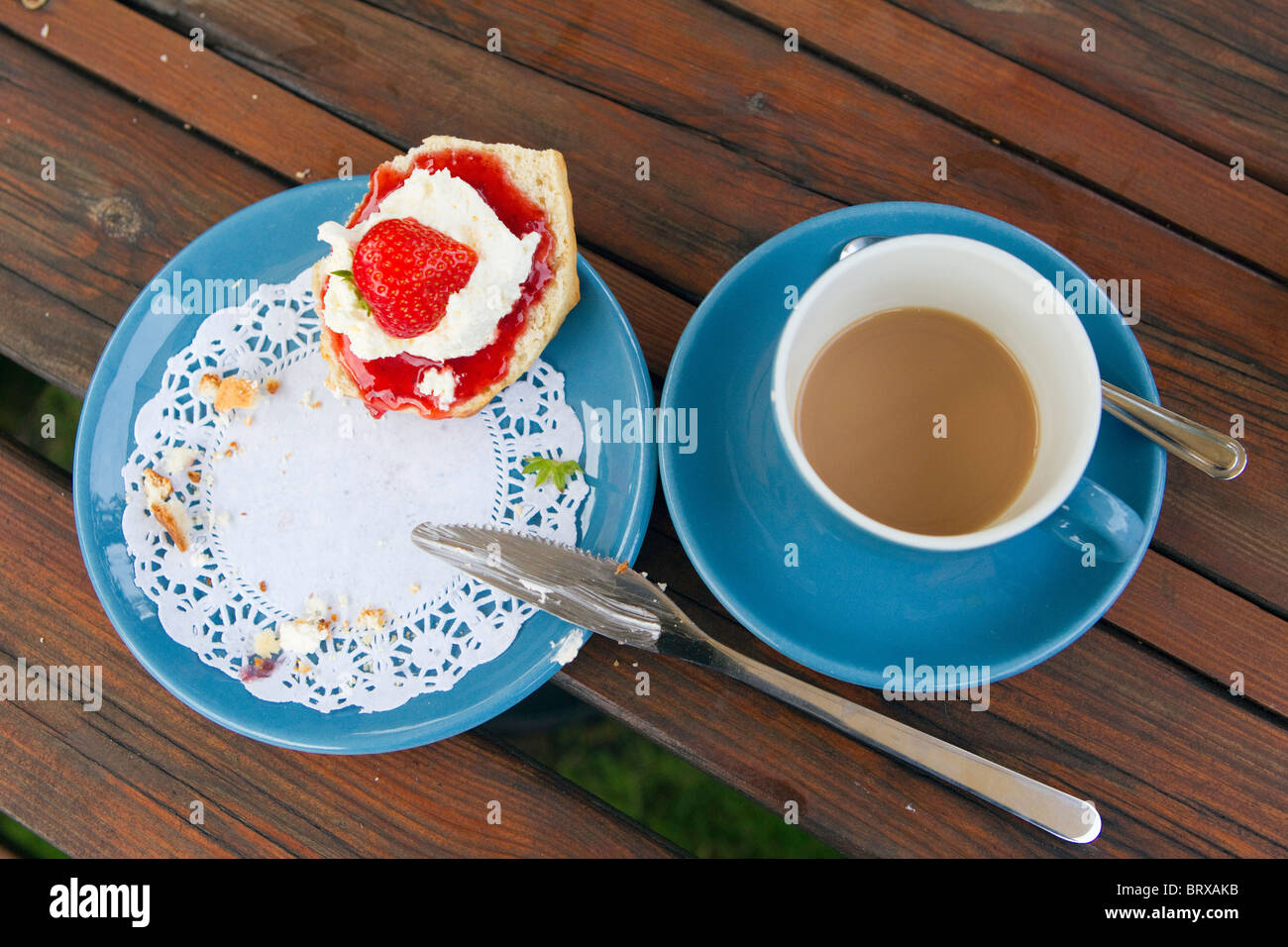 Traditional English Cream Tea with Scone & Strawberry Jam Stock Photo ...