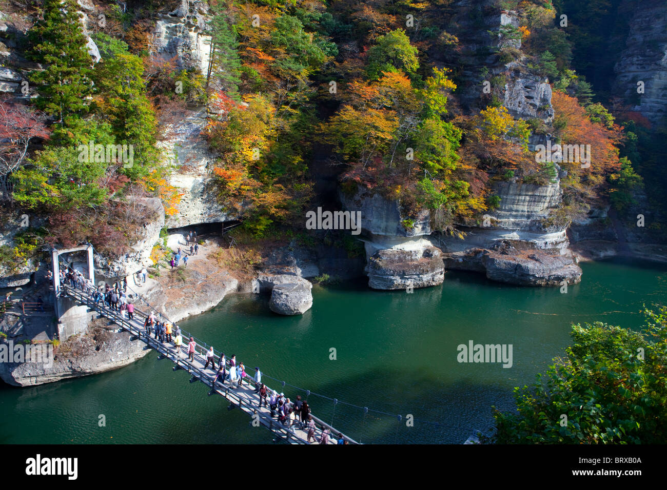 Crowd crossing bridge hi-res stock photography and images - Alamy