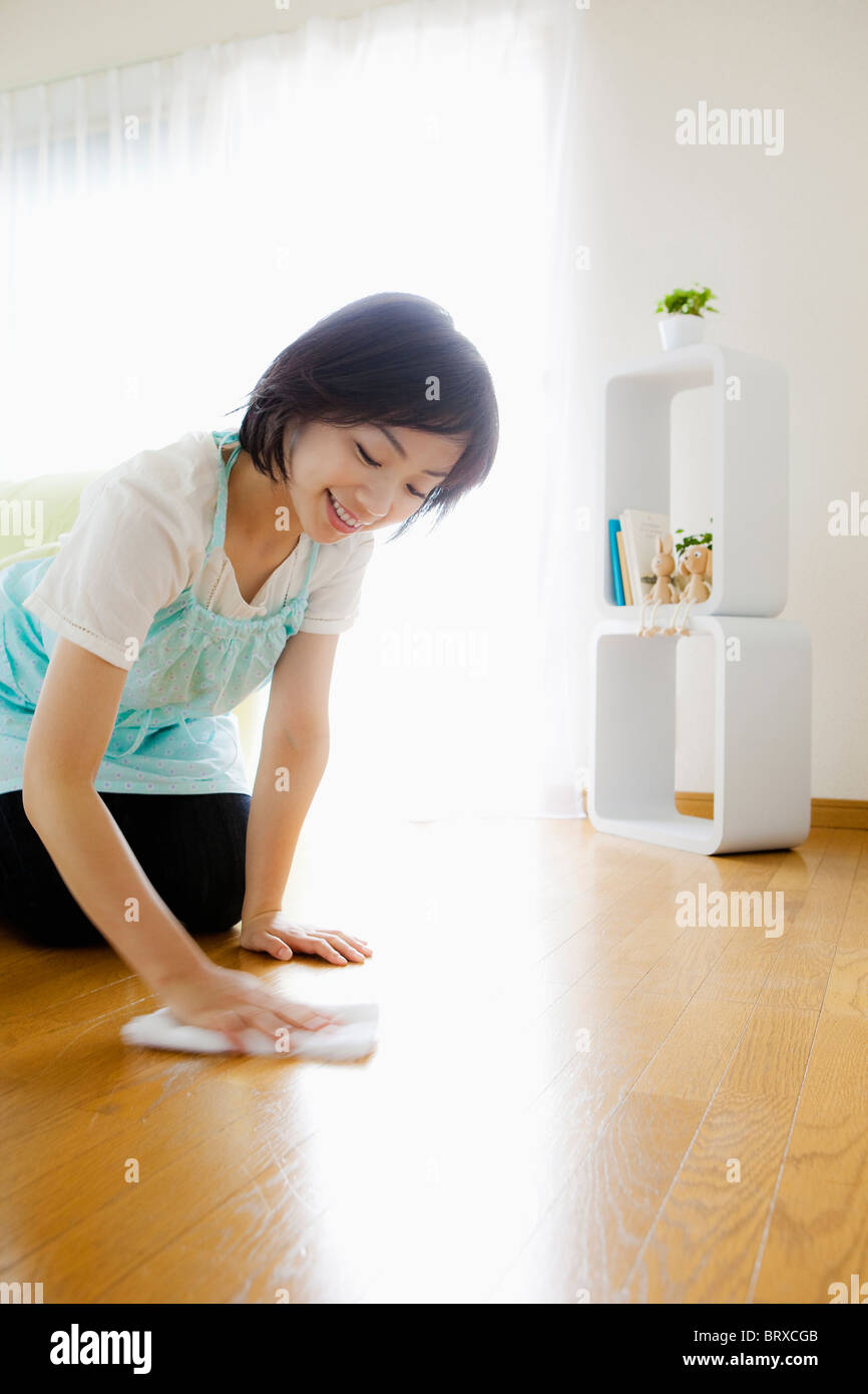Woman Wiping Floor Stock Photo - Alamy