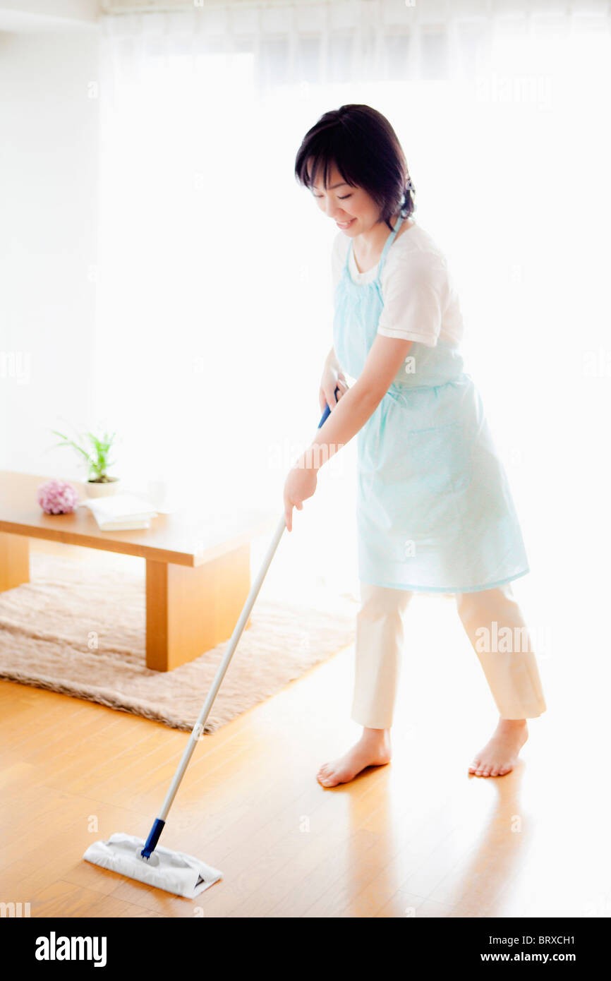 Woman Mopping Floors Stock Photo - Alamy