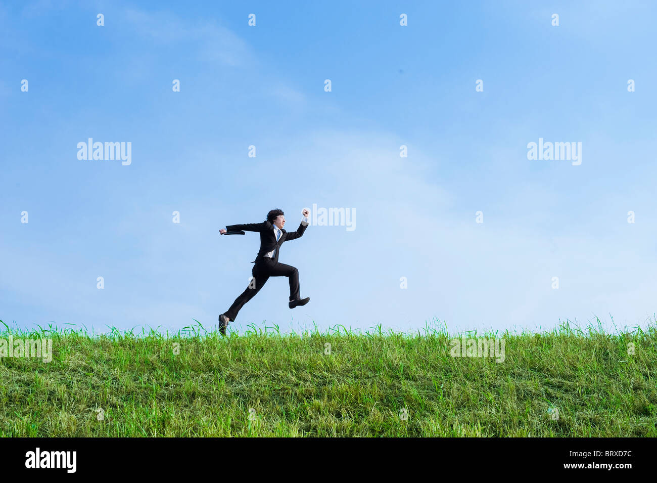 Side view man jumping in hi-res stock photography and images - Alamy