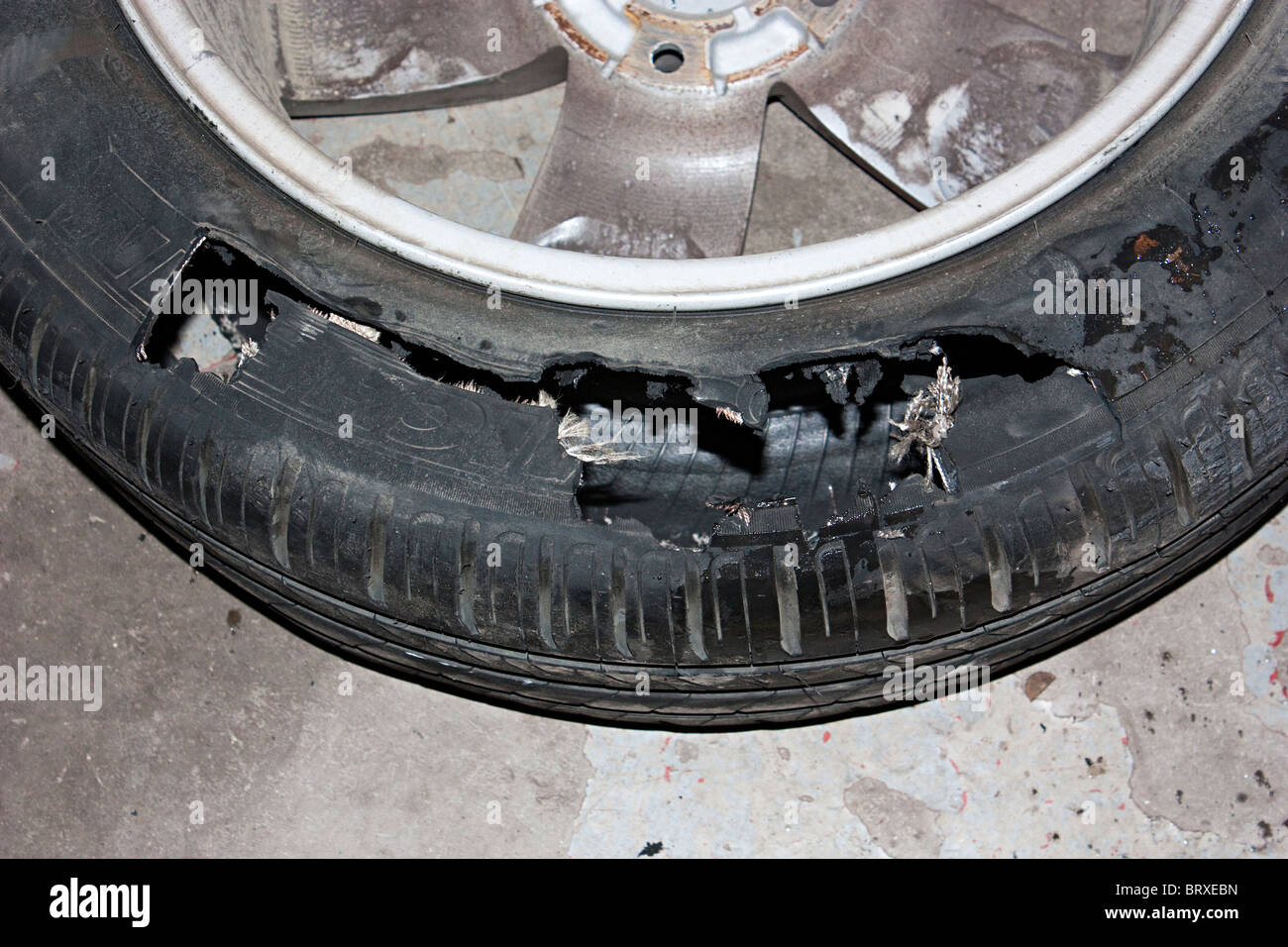 Burst tyre hi-res stock photography and images - Alamy