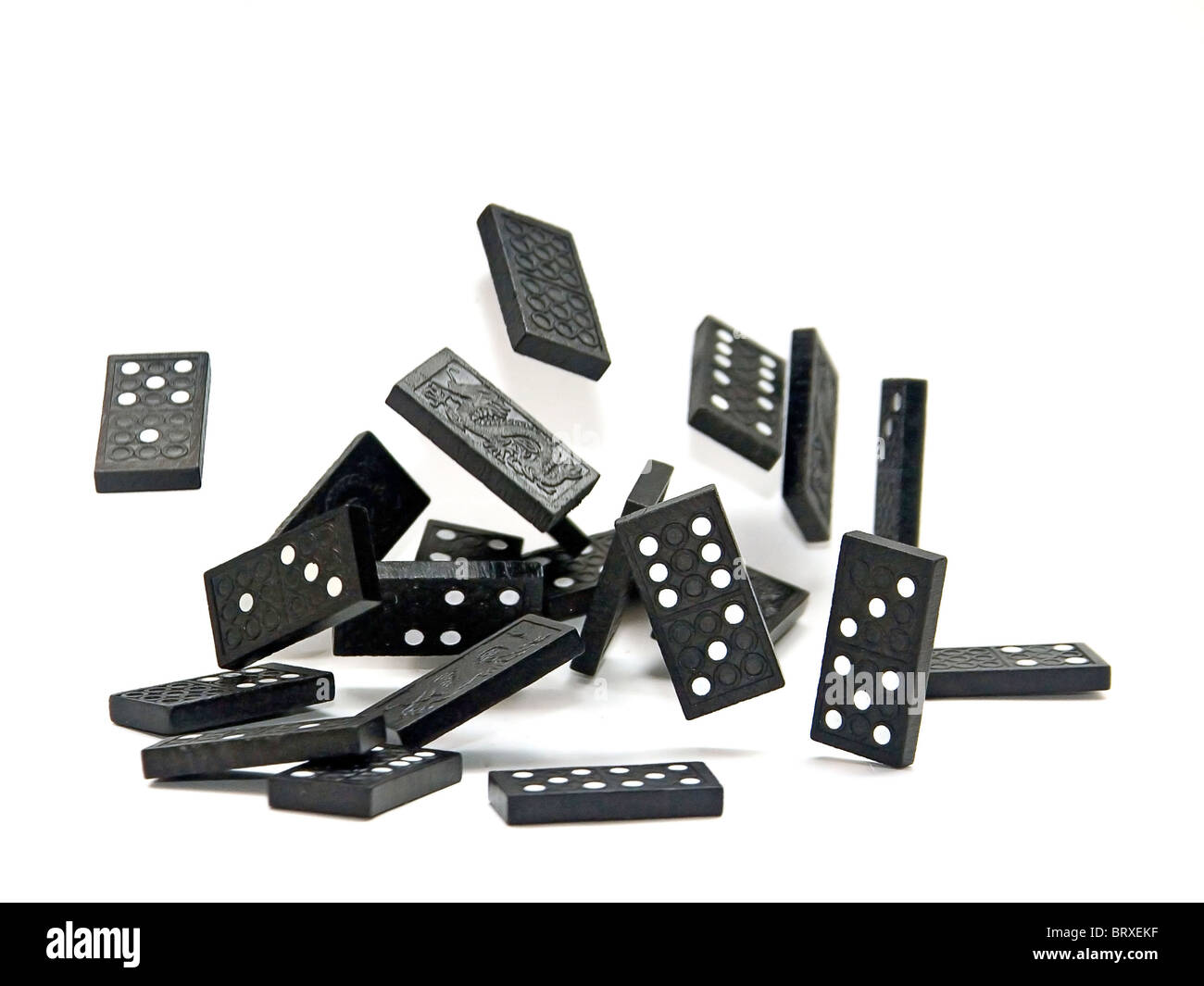 Dominoes falling Cut Out Stock Images & Pictures - Alamy