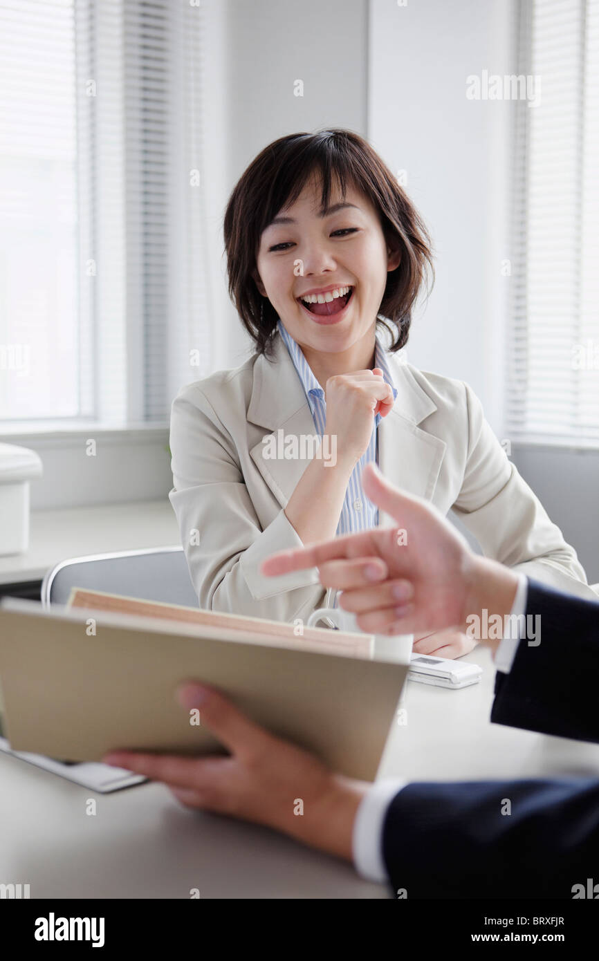 Person showing a book hi-res stock photography and images - Alamy