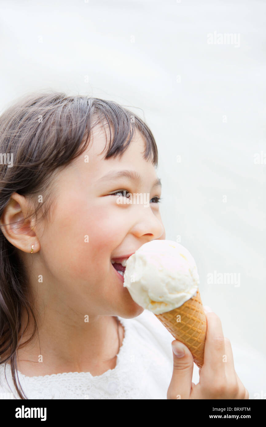 Girl Eating Ice Cream Stock Photo - Alamy