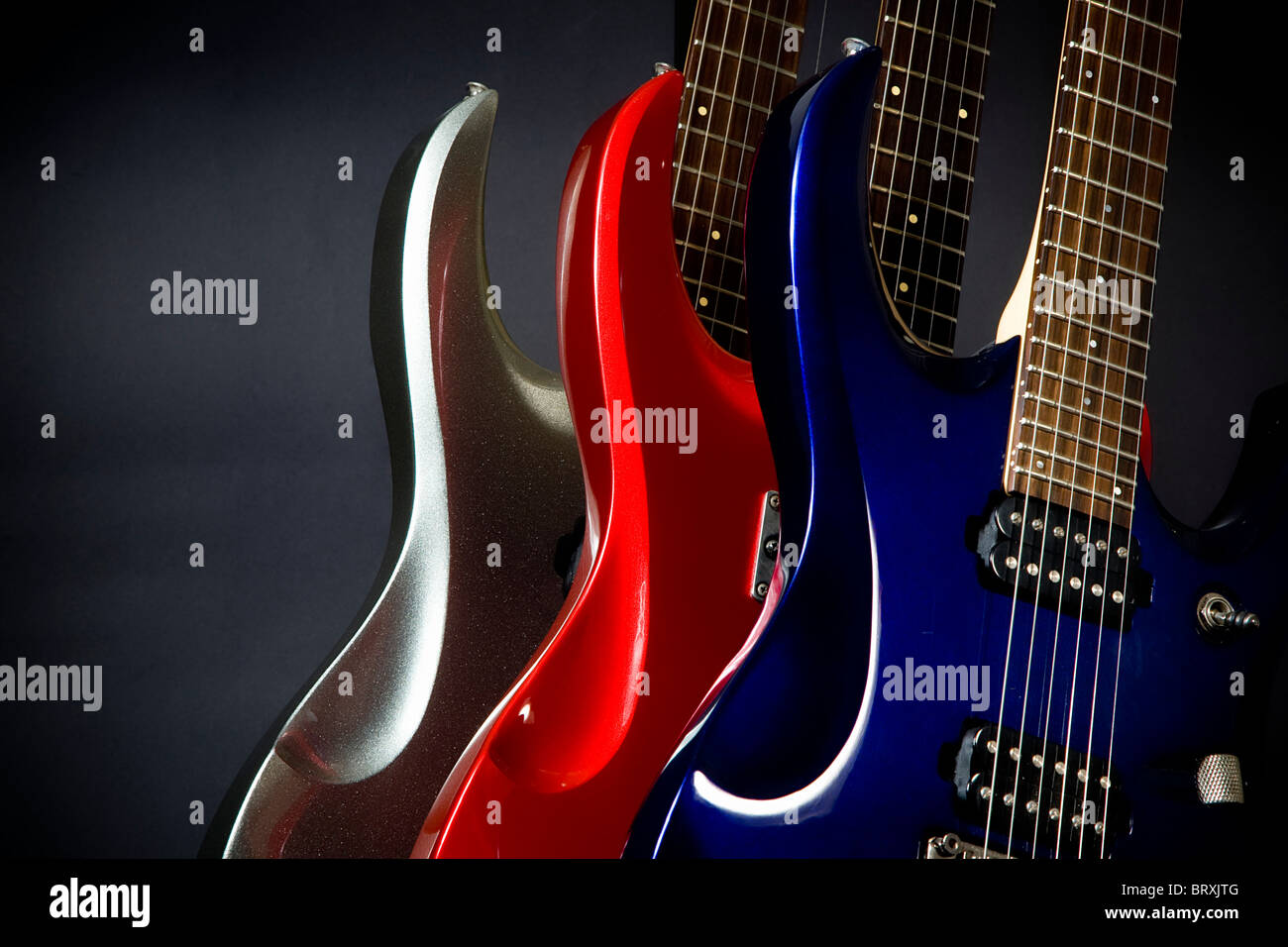 Three Electric guitars - Red guitar, silver guitar, blue guitar Stock ...