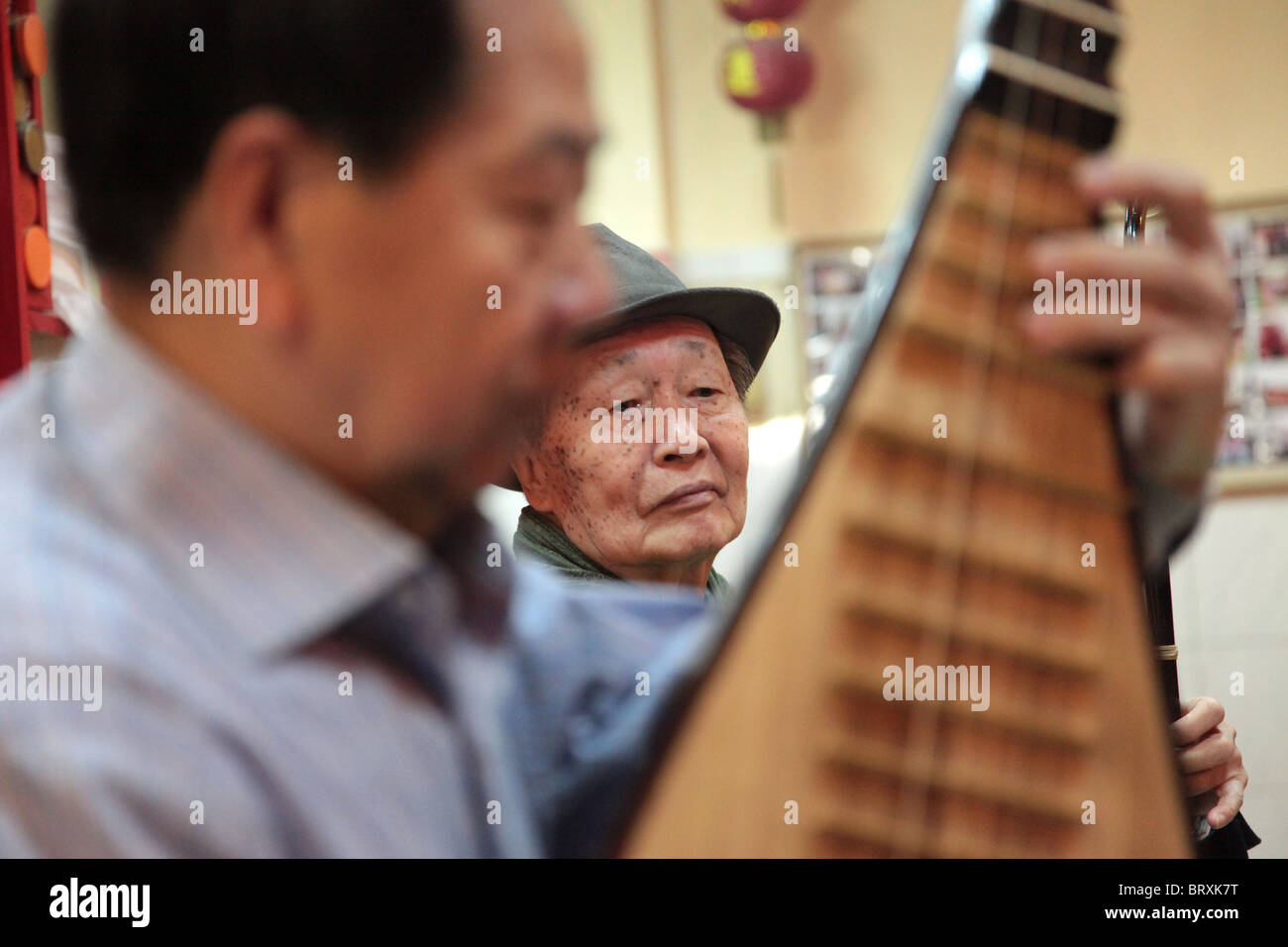 MUSICIANS PLAYING TRADITIONAL CHINESE MUSIC, ALTAR TO BUDDHA, PARIS (75 ...