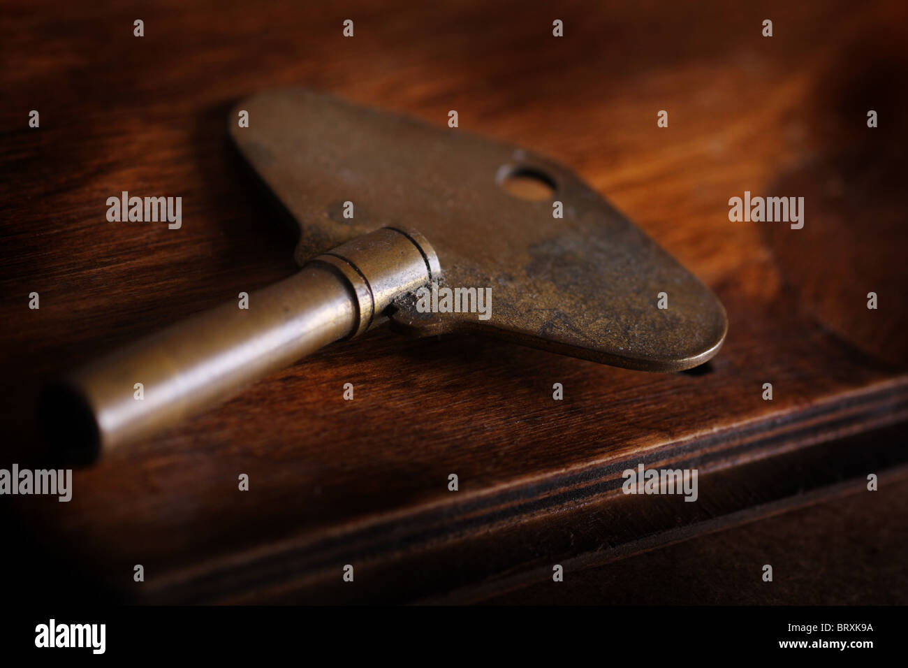 worn antique clock key Stock Photo - Alamy