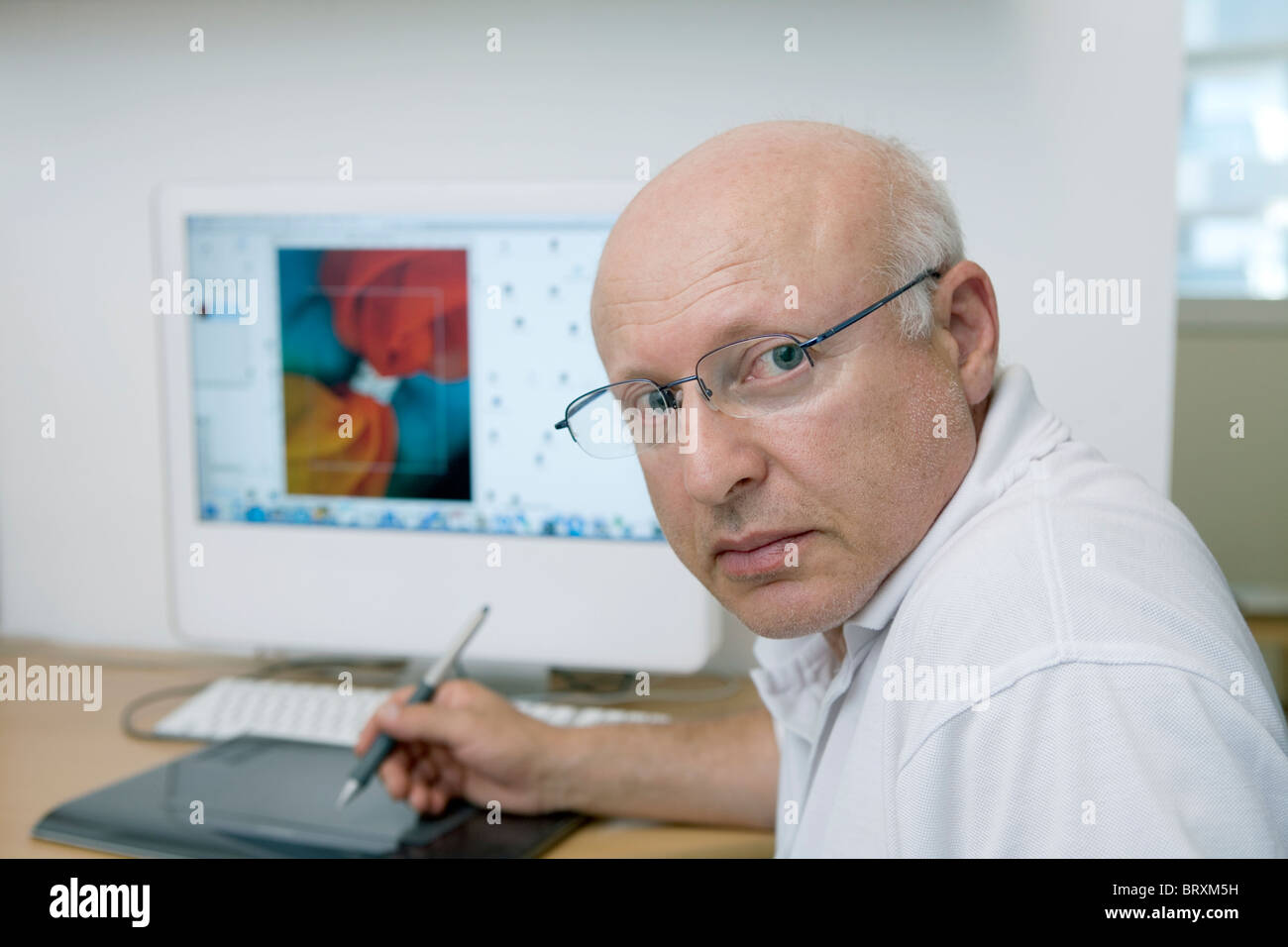 Portrait of graphic designer working on computer Stock Photo - Alamy