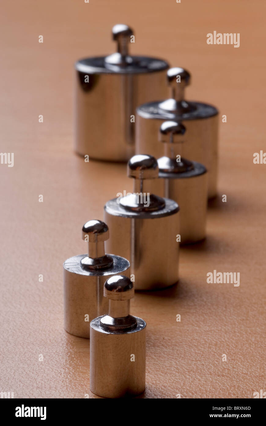 Weights in a row Stock Photo - Alamy