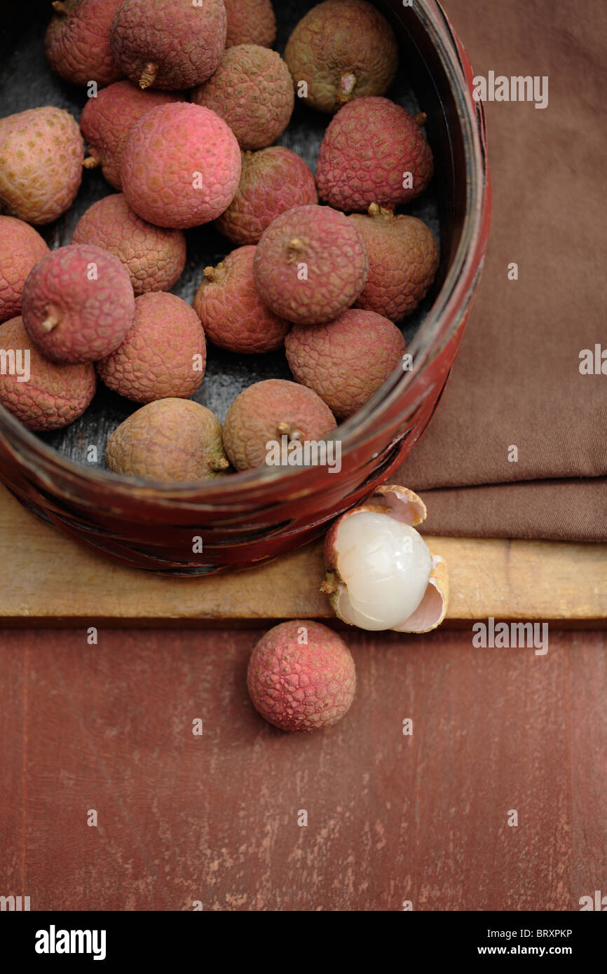 Lychee in basket Stock Photo - Alamy