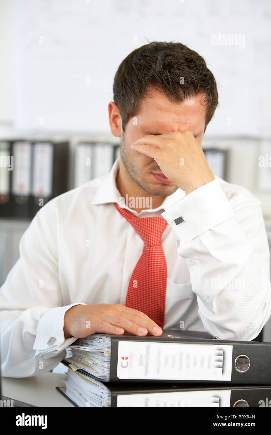 Man in office feeling dull hi-res stock photography and images - Alamy