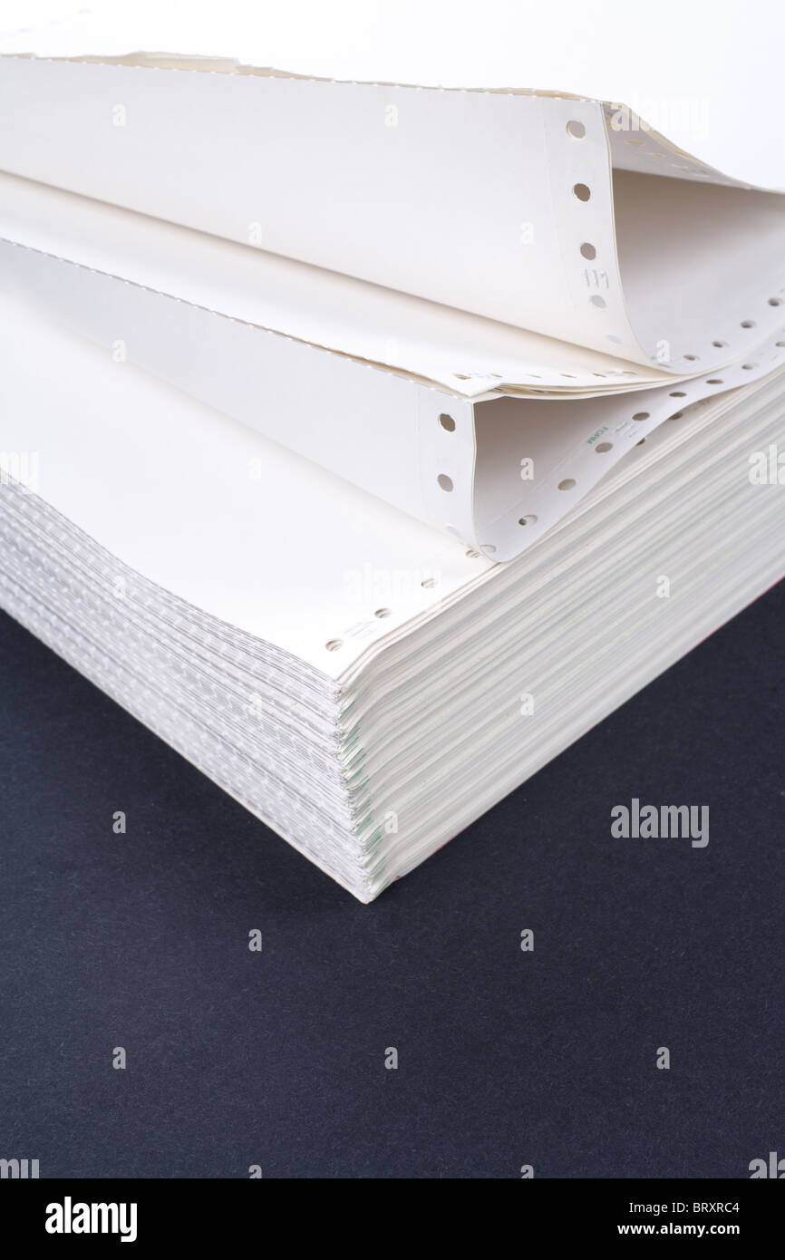 Perforated Computer Paper for background Stock Photo - Alamy