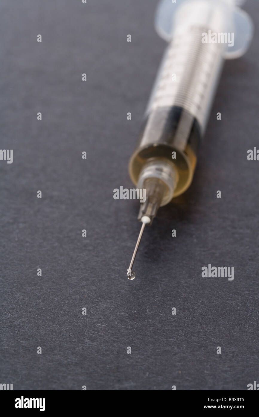 Syringe close up shot for background Stock Photo - Alamy