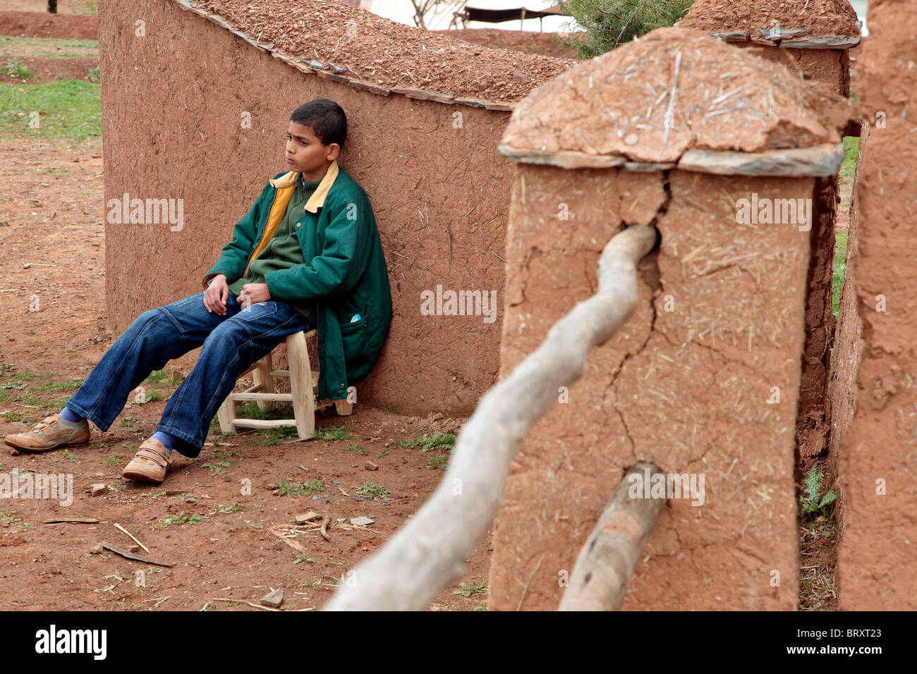 BERBER CHILD IN FRONT OF HIS HOUSE, TERRES D'AMANAR, TAHANAOUTE, AL ...