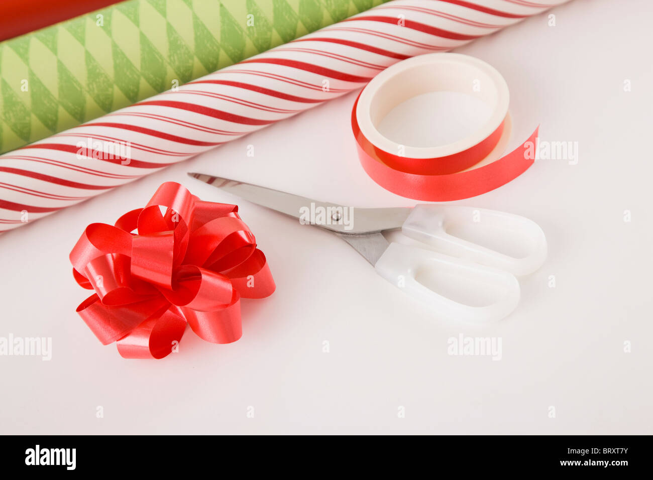 Wrapping paper, ribbon and scissors Stock Photo - Alamy