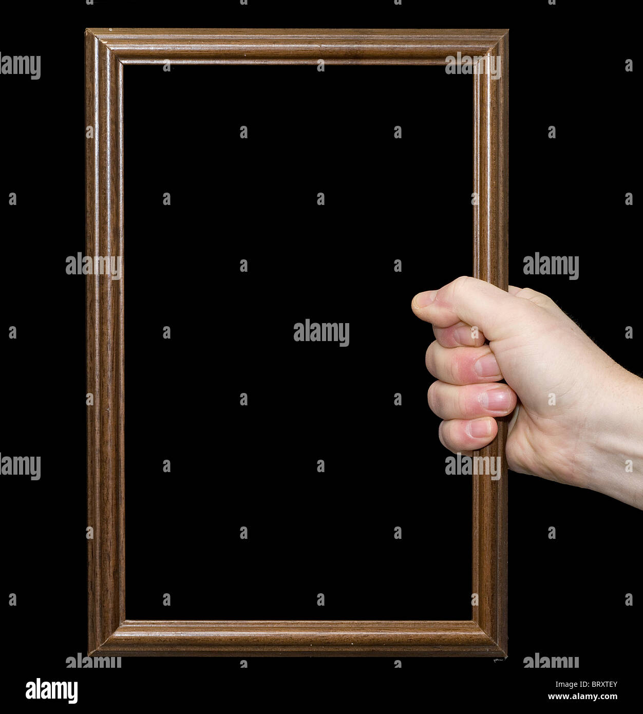 A frame in the hand Stock Photo - Alamy