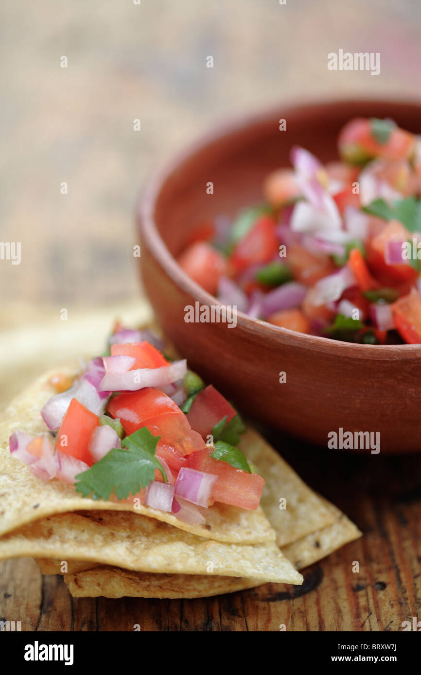 Salsa fresca in bowl and on tortilla chip Stock Photo - Alamy