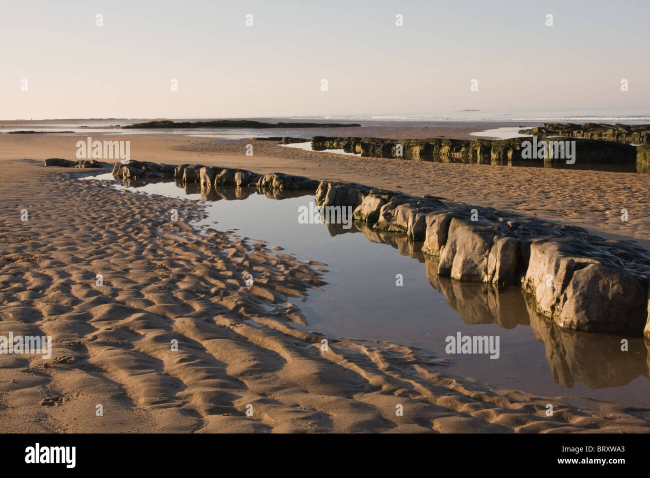 Coastal puddles and pools, Seahouses Stock Photo - Alamy