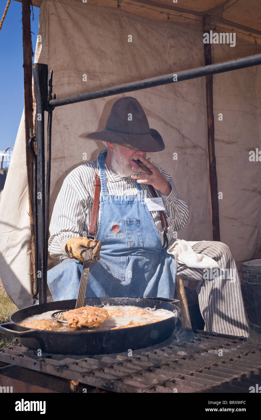 A cigar-smoking cowboy cook, at the Lincoln County Cowboy Symposium and ...