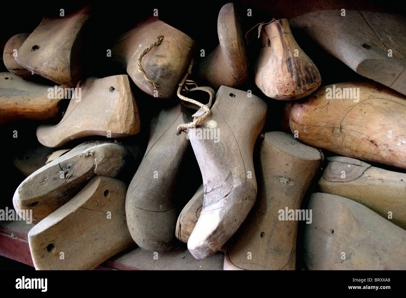 Antiquated prosthetic feet rest on a shelf at The National ...