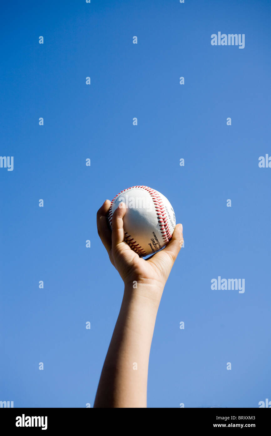 Hand holding baseball hi-res stock photography and images - Alamy