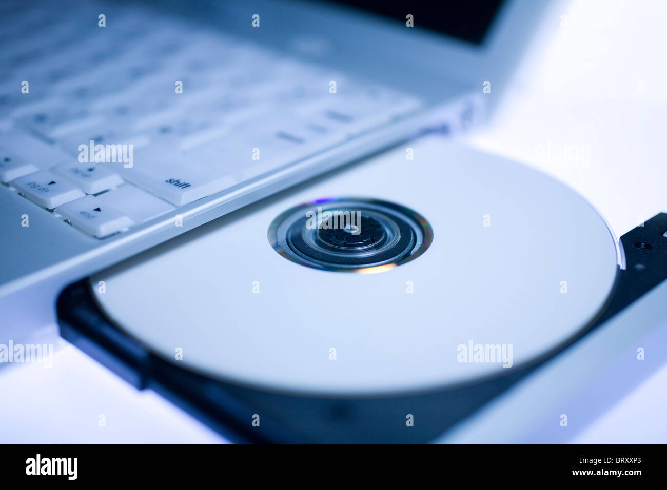 Laptop and CD Stock Photo - Alamy