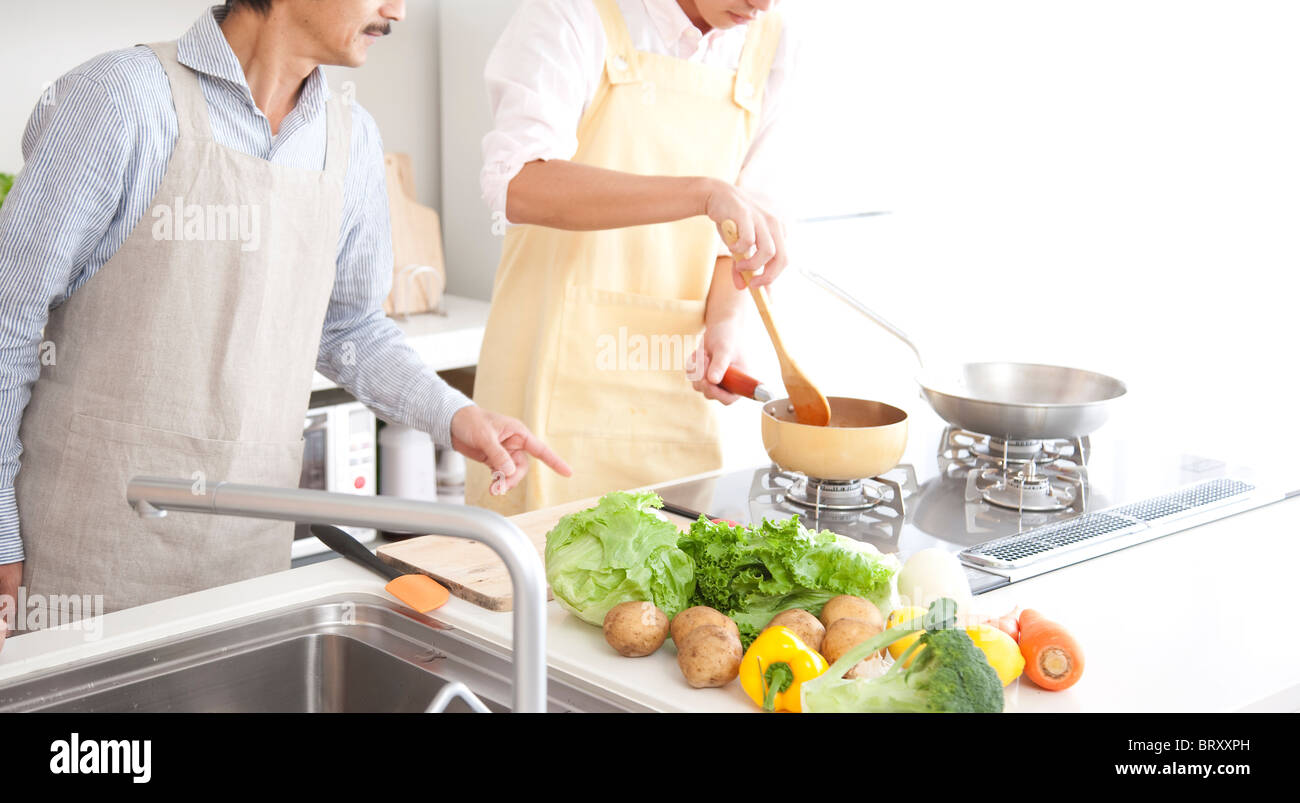 A family cooking Stock Photo - Alamy