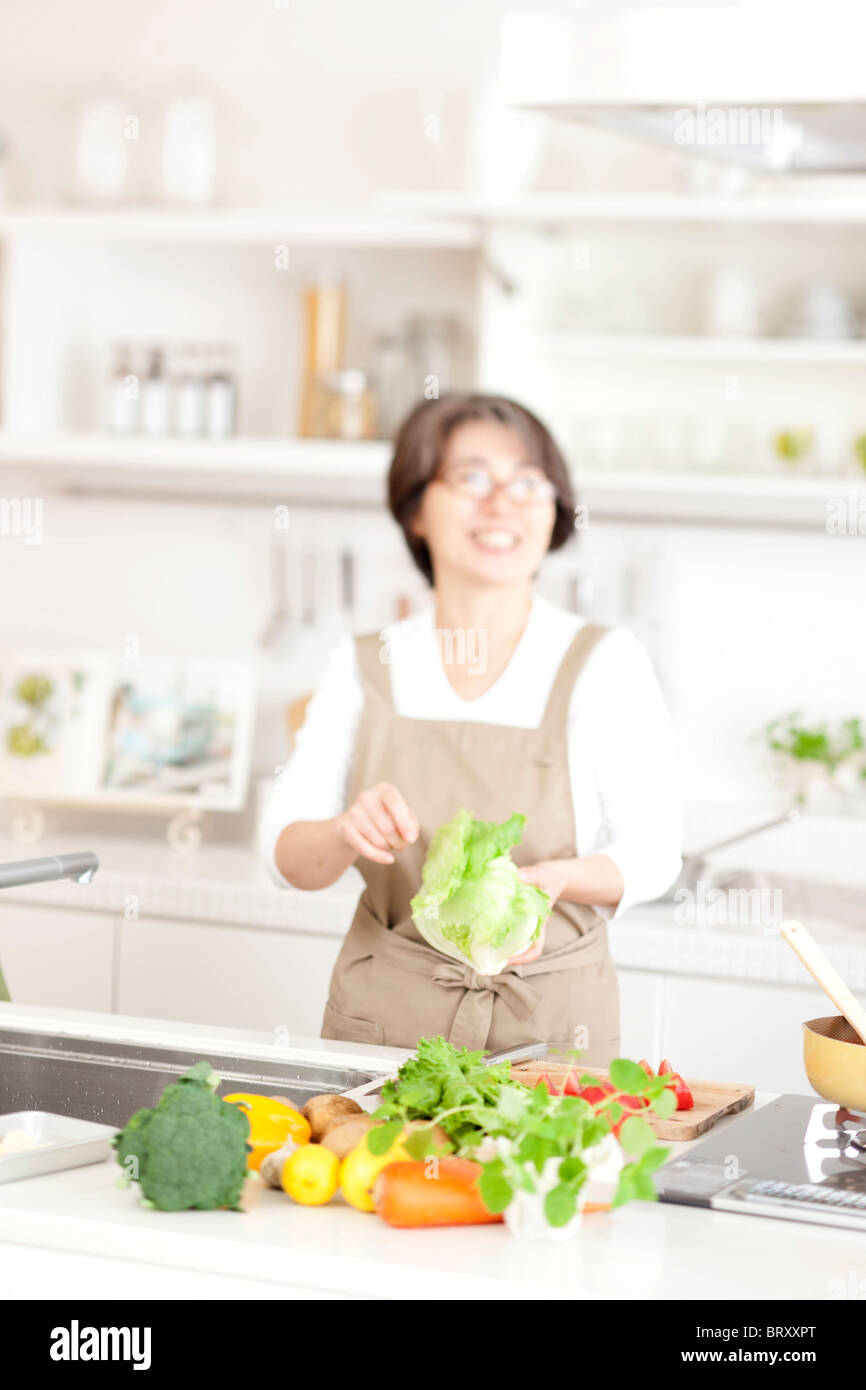A woman cooking Stock Photo - Alamy