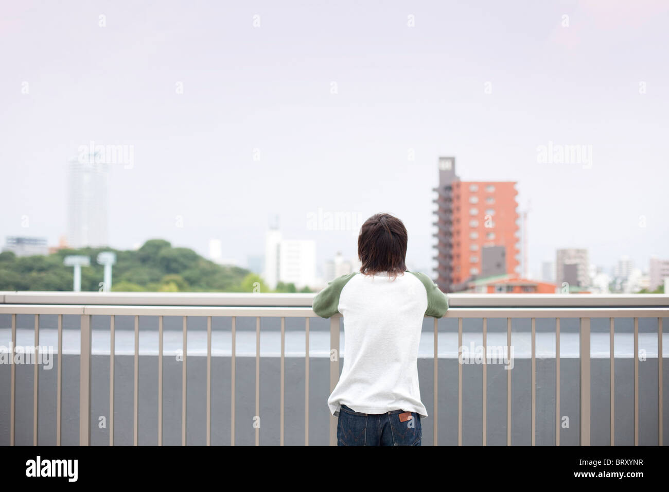 Rear view standing hi-res stock photography and images - Alamy