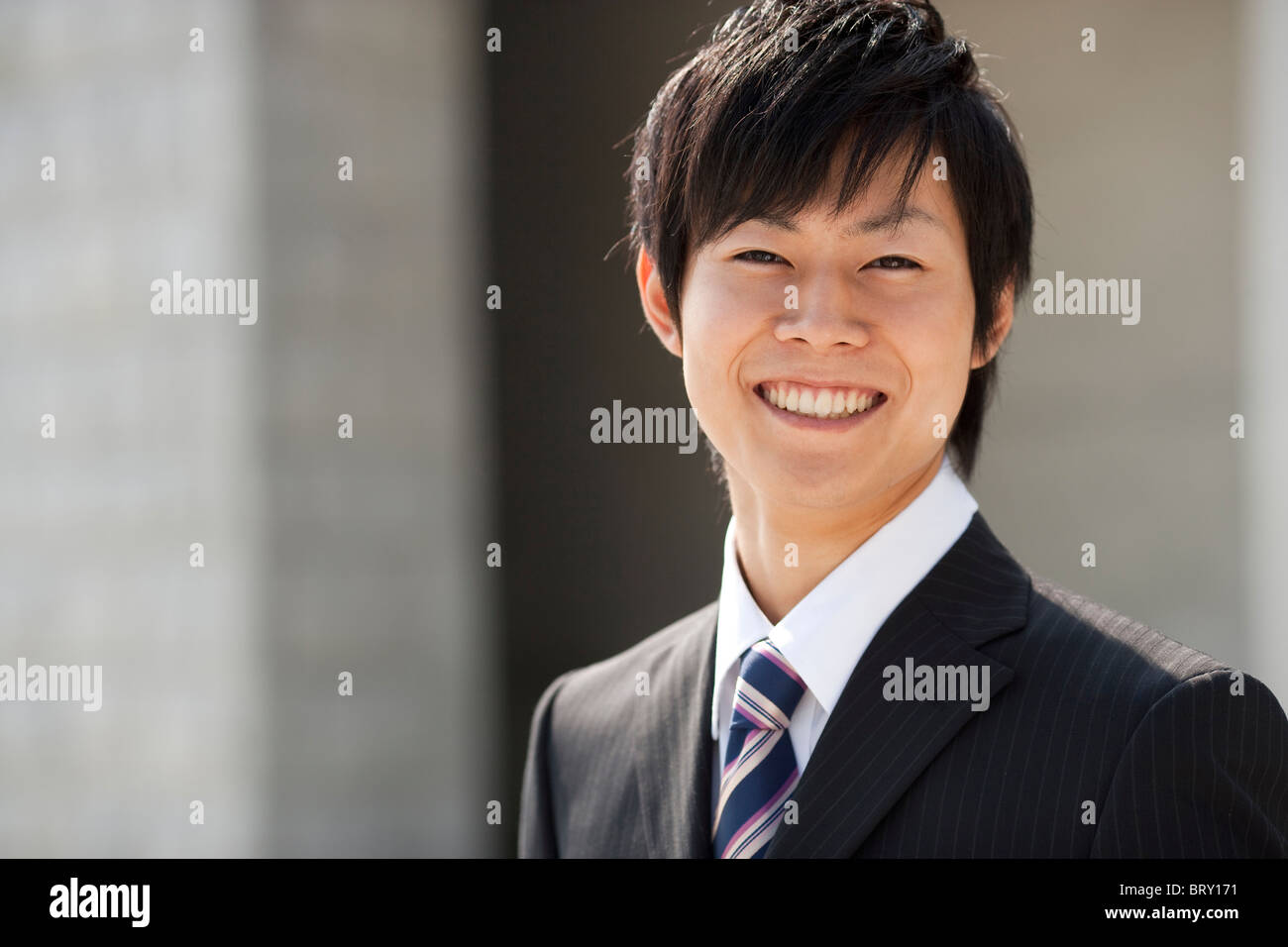 A smiling businessman Stock Photo - Alamy