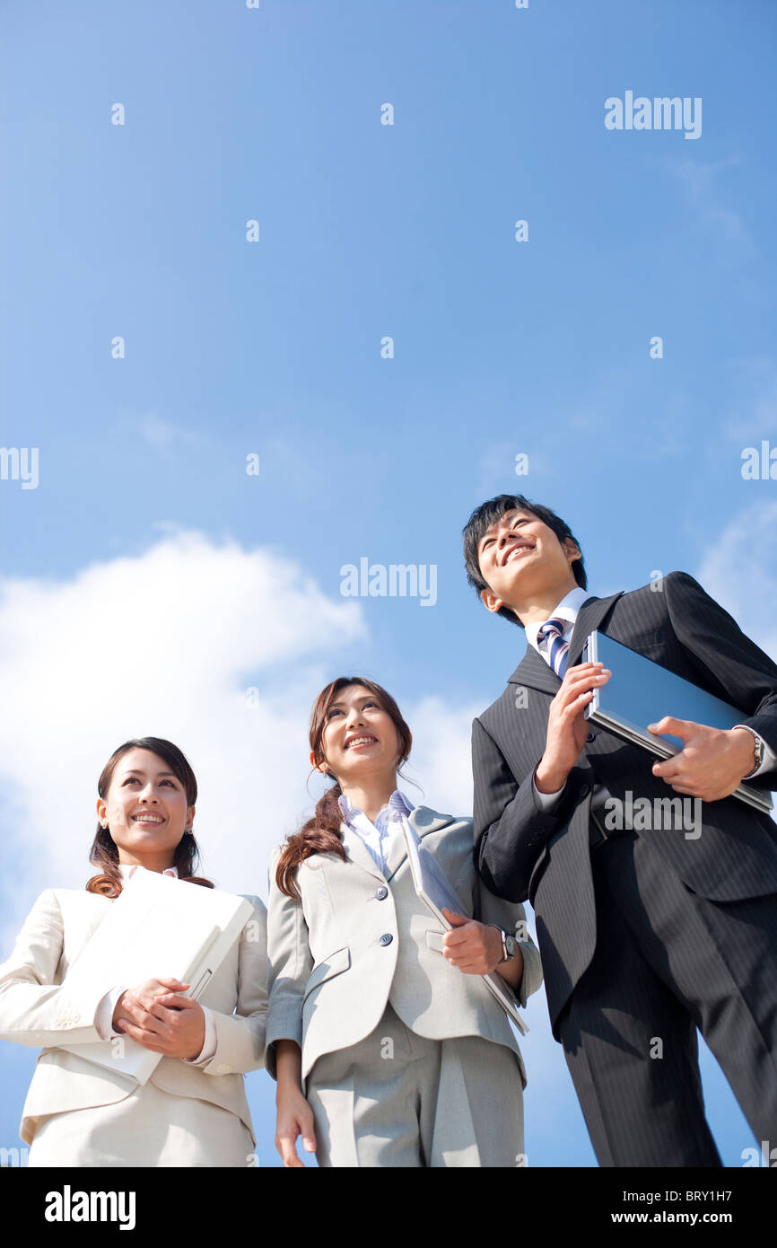 Business people standing Stock Photo - Alamy