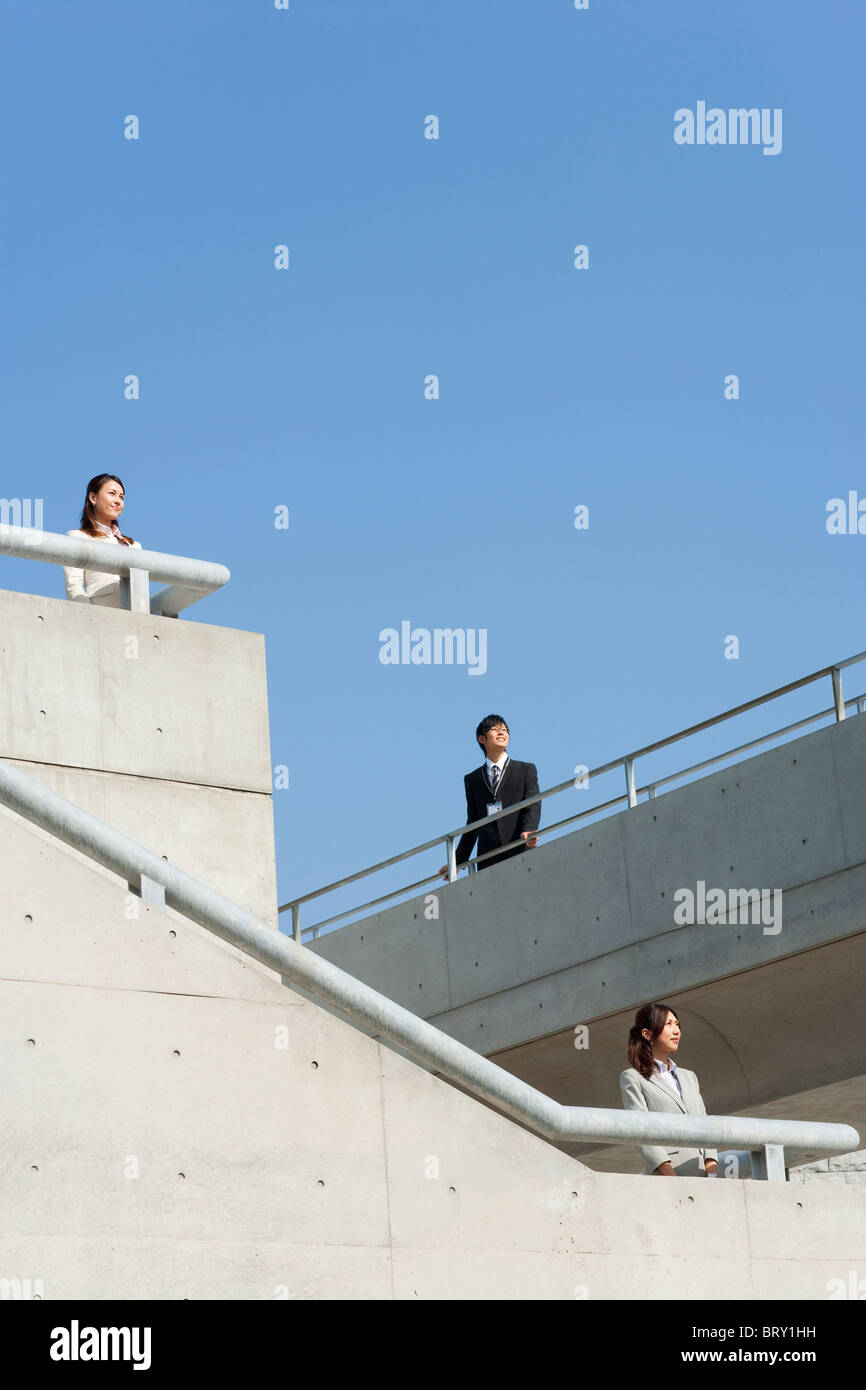 Business people looking into far distance Stock Photo - Alamy
