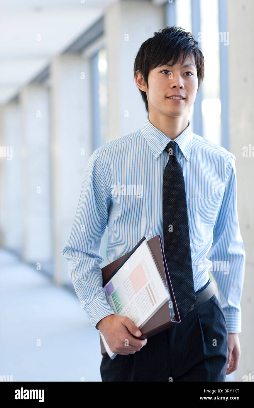 A businessman holding file Stock Photo - Alamy A businessman holding file Stock Photo - Alamy
