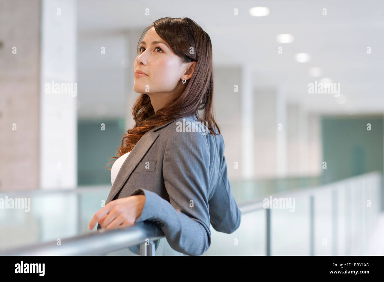A business woman looking into far distance Stock Photo - Alamy