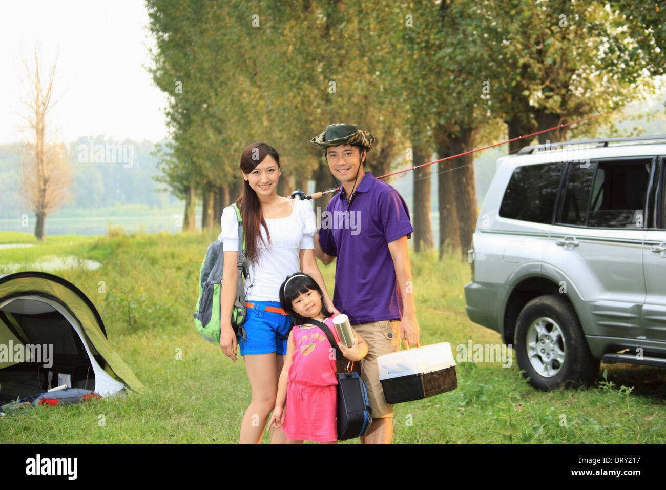 Family on field trip Stock Photo - Alamy