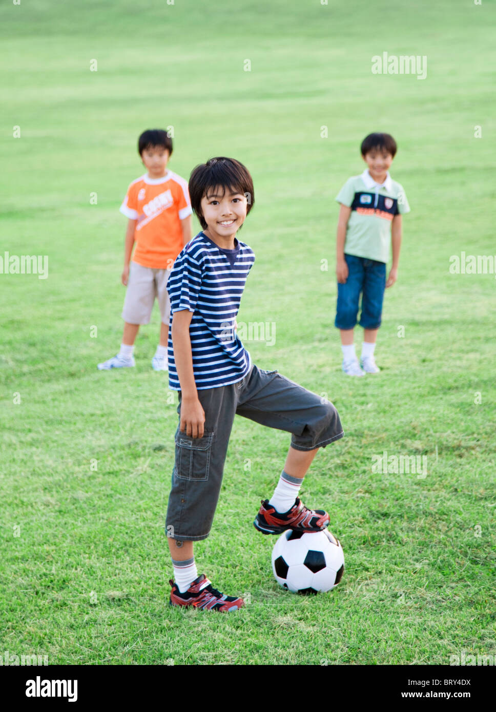 Rural boys playing soccer hi-res stock photography and images - Alamy