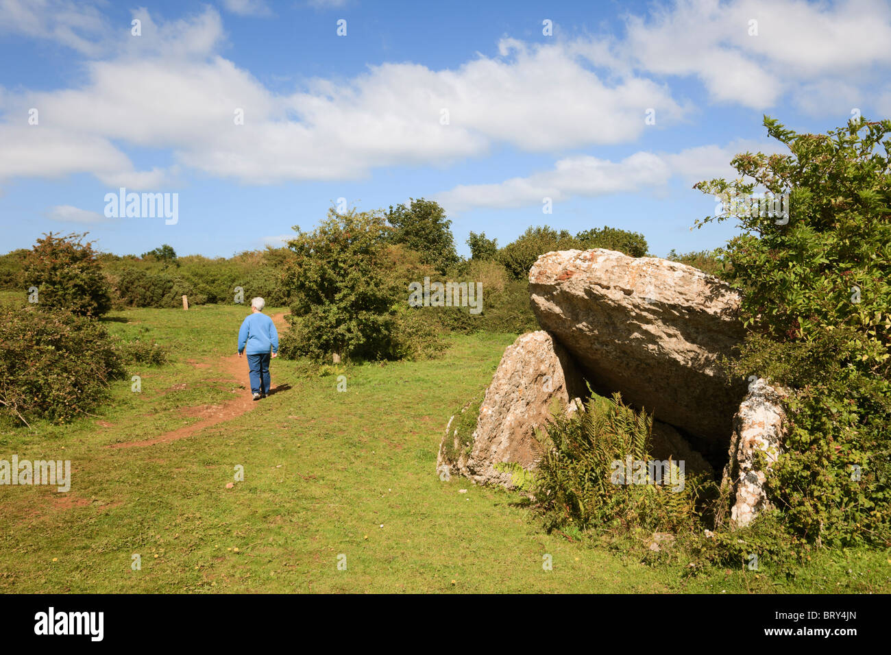 Pant-y-Saer Neolithic burial chamber tomb or Cromlech with walker on ...