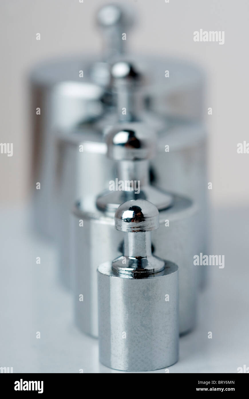 Weights in a row Stock Photo - Alamy