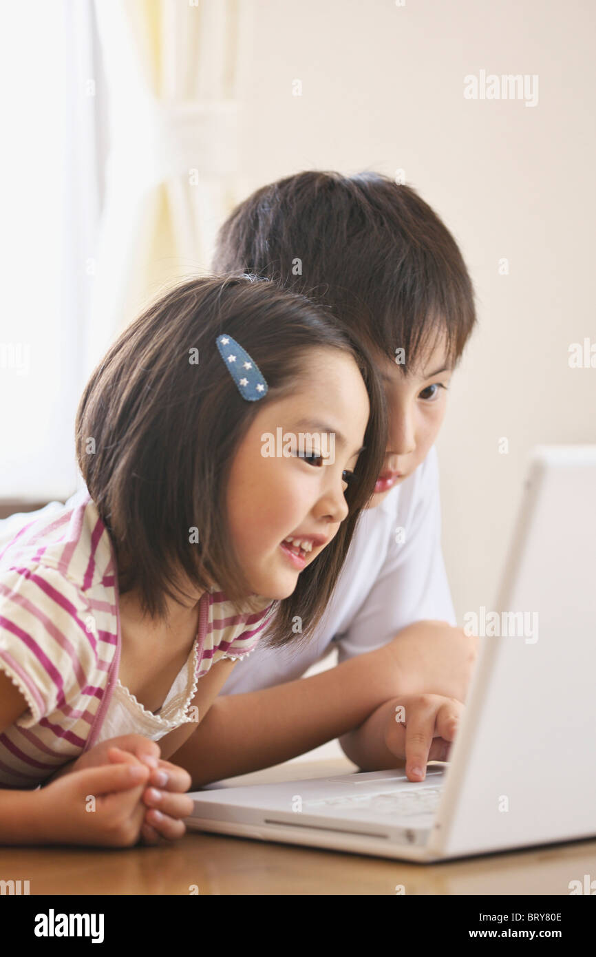 Children using laptop Stock Photo - Alamy
