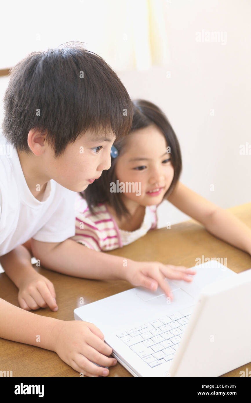 Children using laptop Stock Photo - Alamy