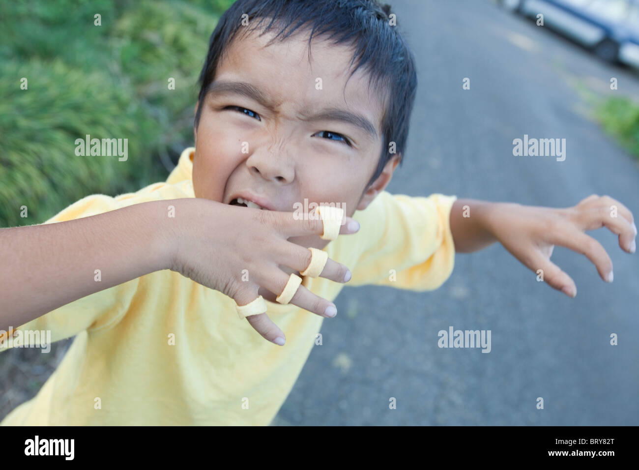 Close-up of a boy making a face, Japan Stock Photo - Alamy