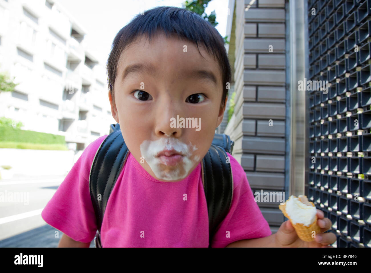 Close-up of a boy making a face, Japan Stock Photo - Alamy